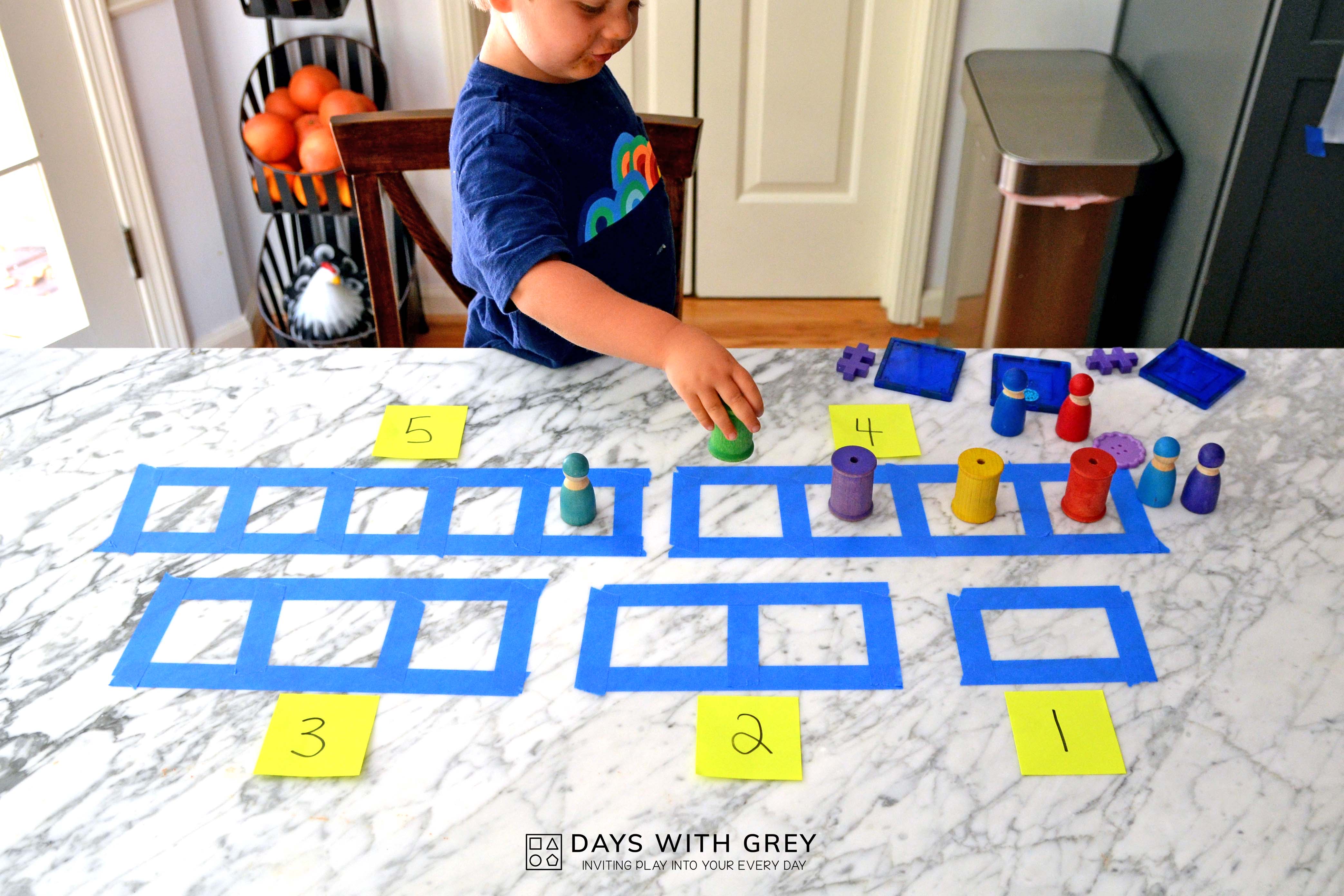Tape, Toddlers, and Toys: A Toddler Counting Activity - Days With Grey