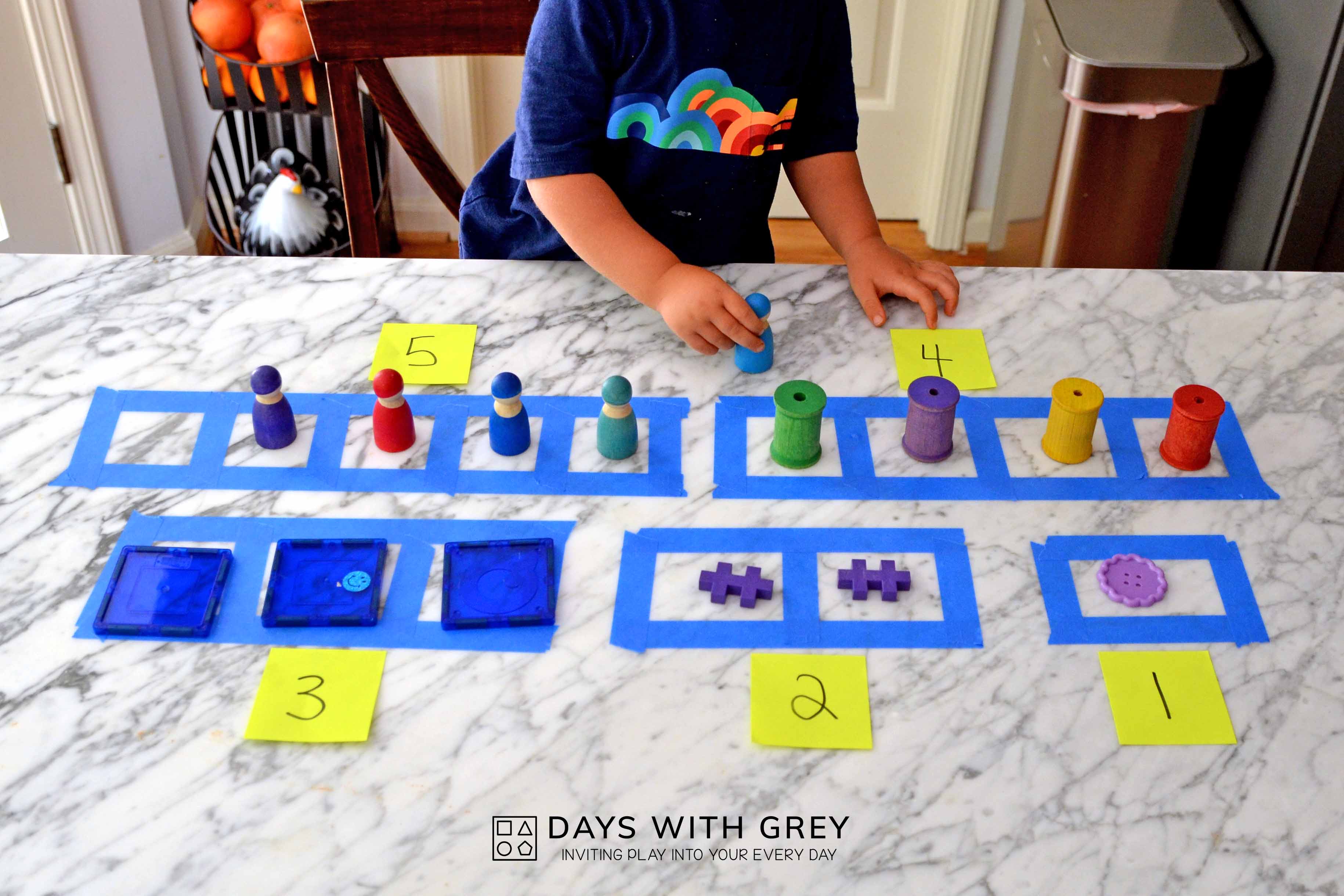 Tape, Toddlers, and Toys: A Toddler Counting Activity - Days With Grey